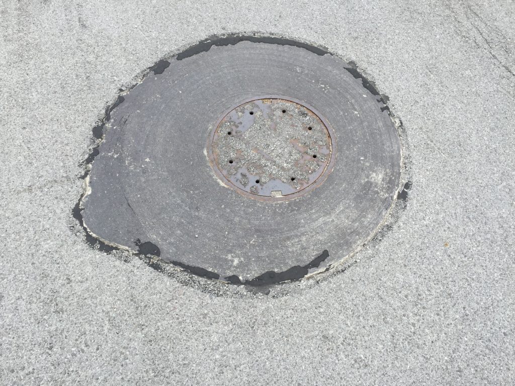 How do you adjust manhole frames/lids - Mr. Manhole