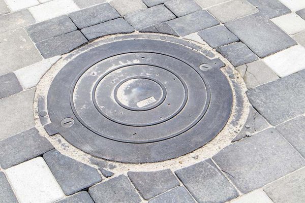 Manhole frame and Lid Adjustments Pay Off! - Mr. Manhole